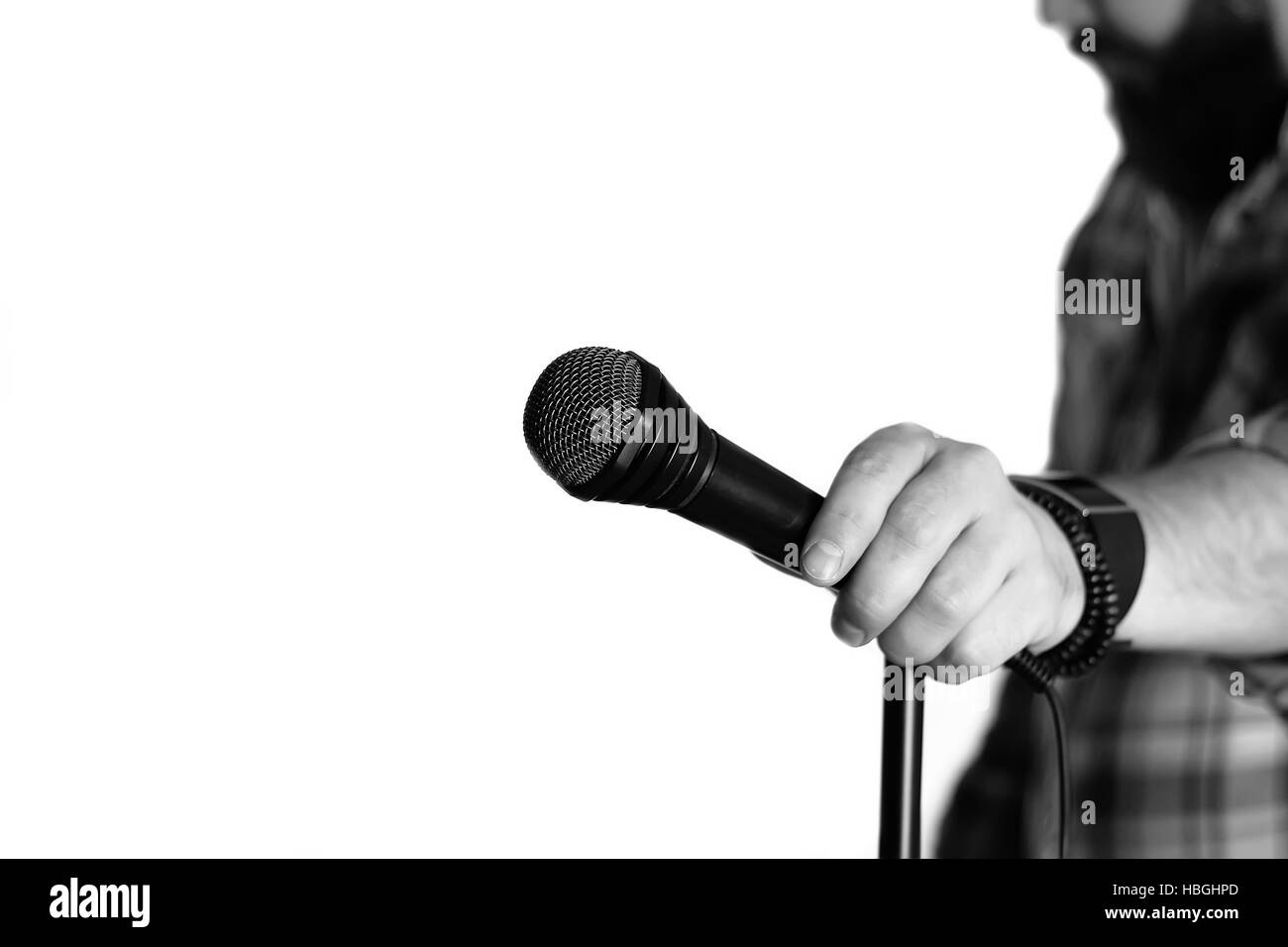 Microphone isolated man hand Stock Photo - Alamy