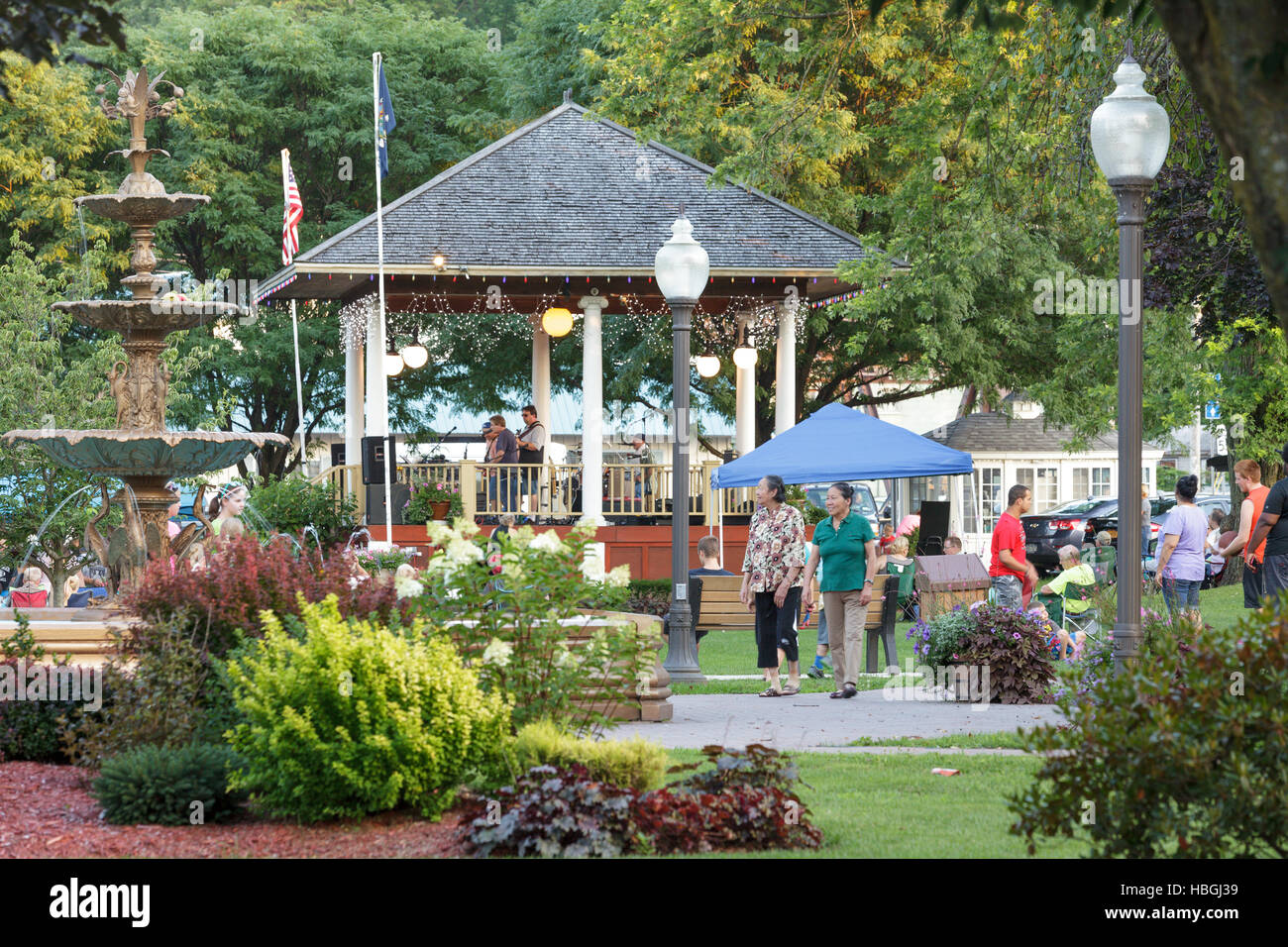 Community enjoys a concert under the bandstand in Hazlett Park, Fort ...