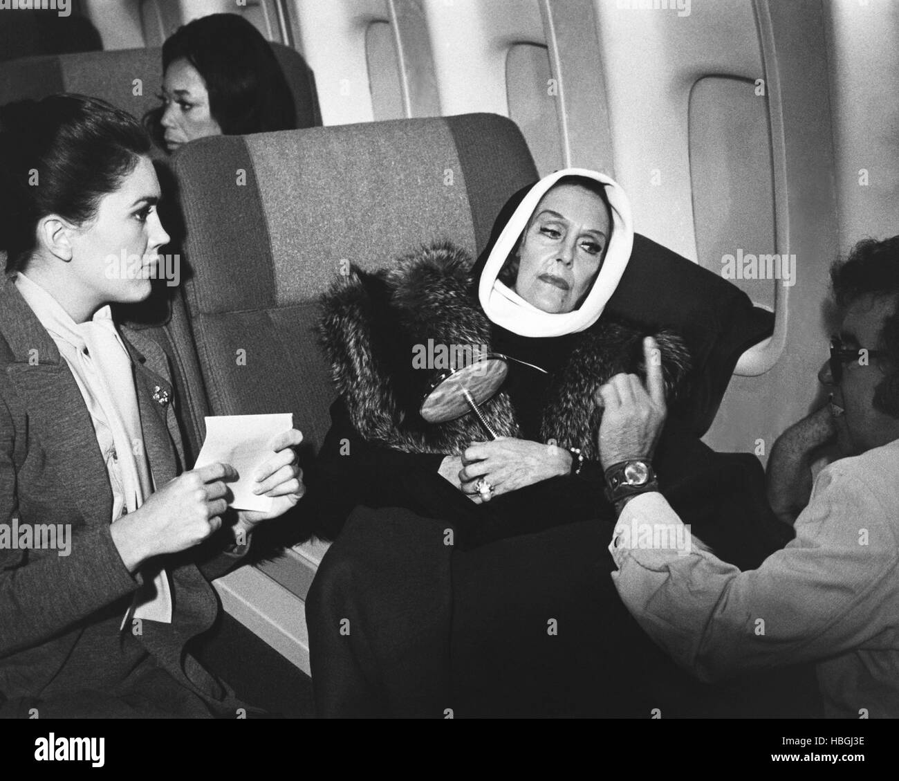 AIRPORT 1975, from left, Linda Harrison, Gloria Swanson, director Jack ...