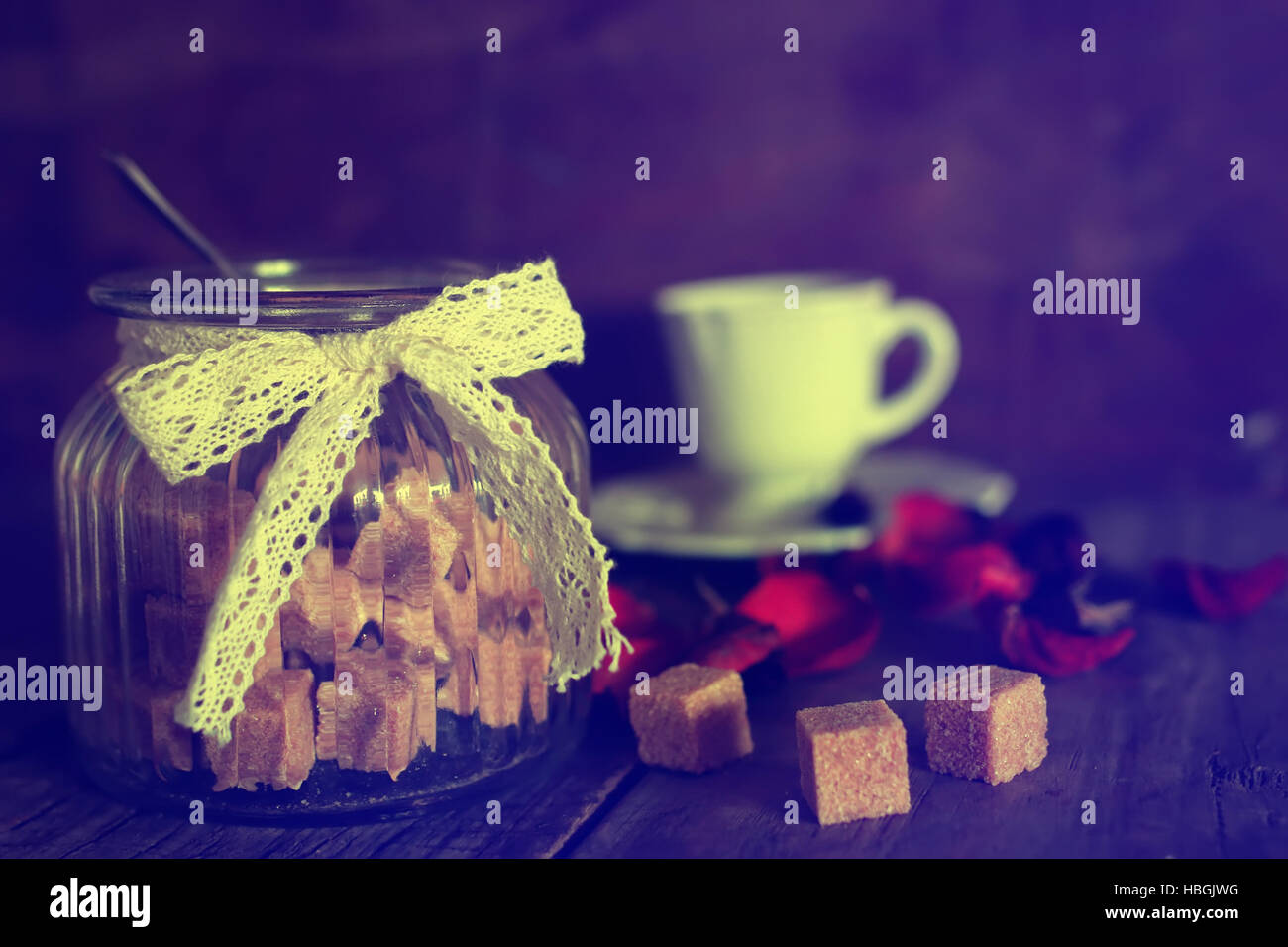toned photo tea cup with sugar cubes Stock Photo - Alamy