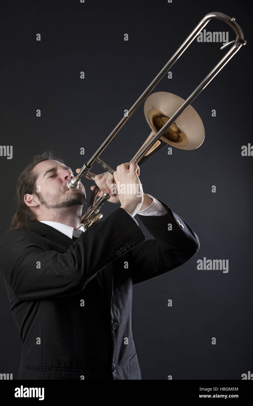 Trombonist, trombone player Stock Photo - Alamy