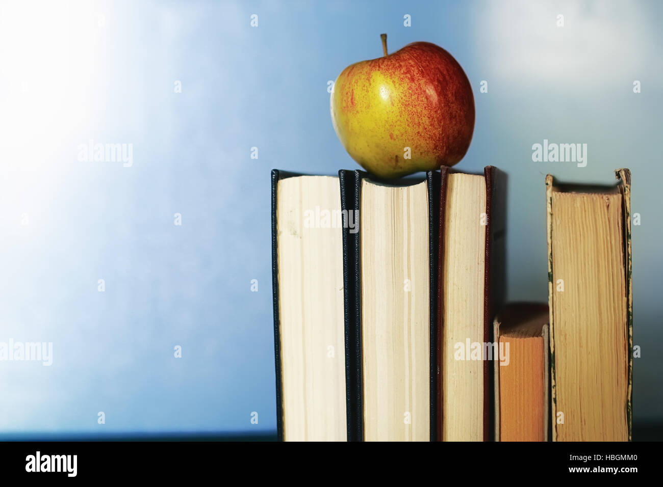 education concept books stack, apple and pen Stock Photo - Alamy