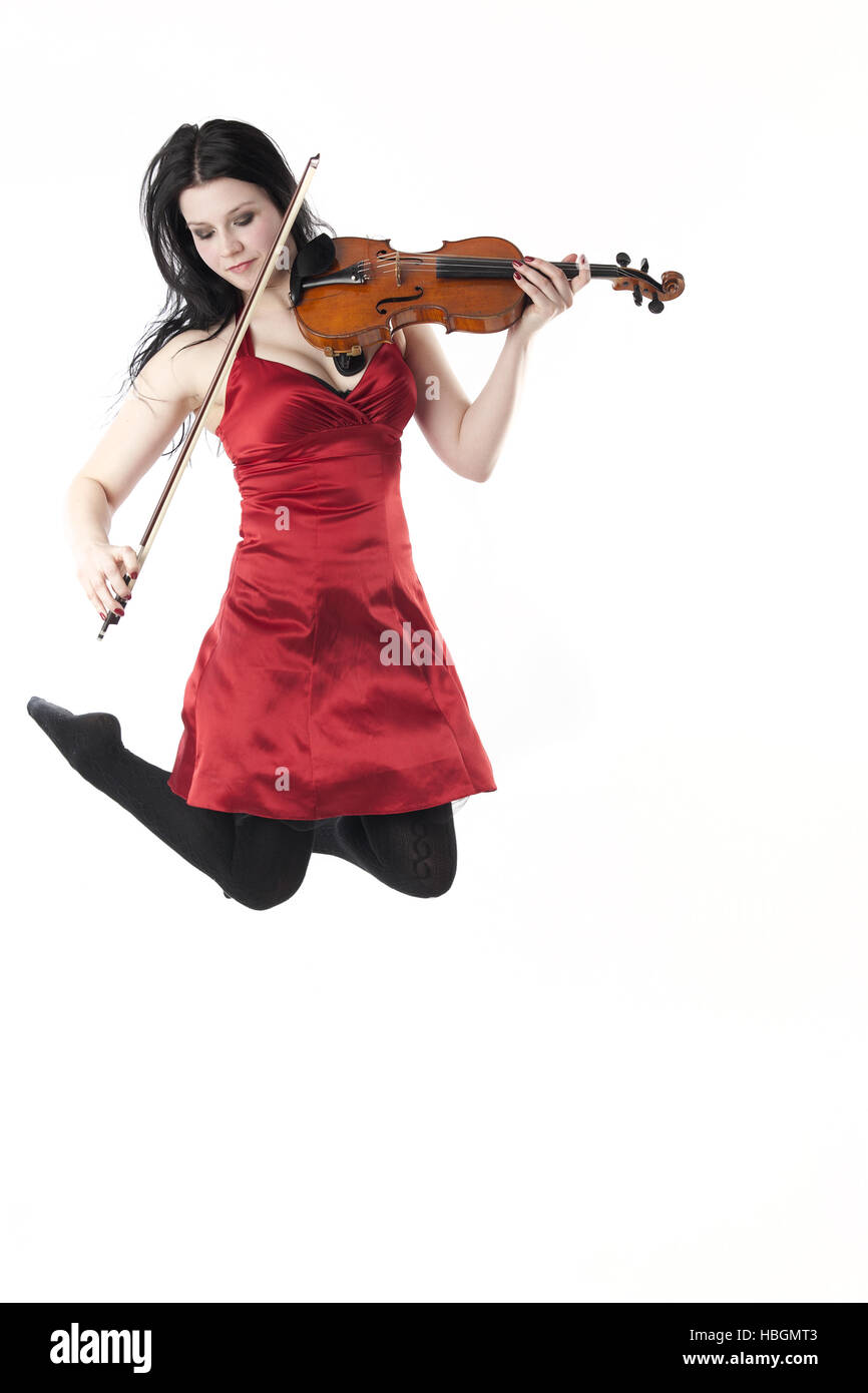 Musician in red dress Cut Out Stock Images & Pictures - Alamy