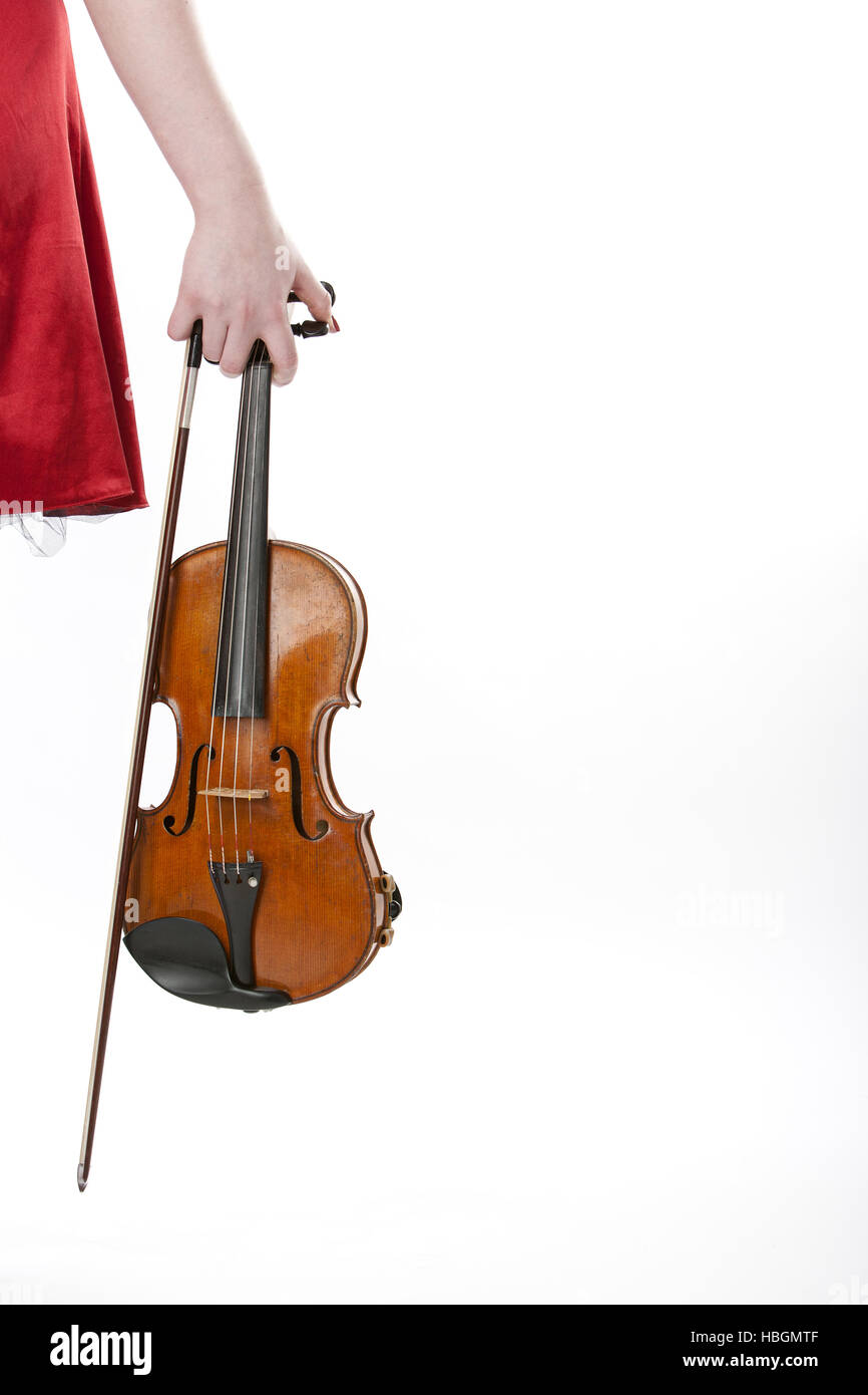 Female hand holding violin Stock Photo - Alamy