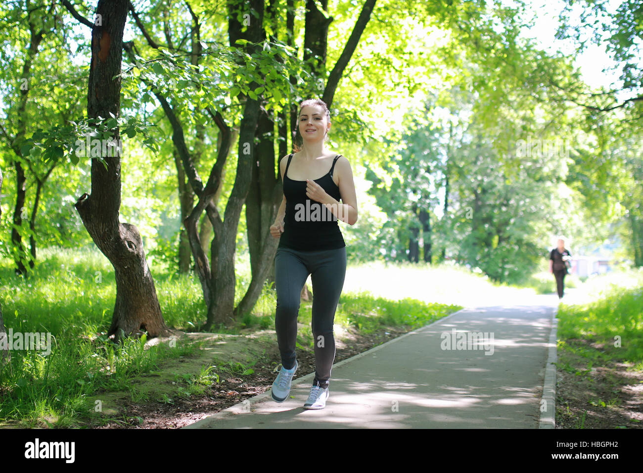 woman sport run in park outdoor Stock Photo - Alamy