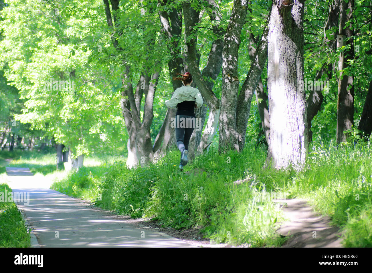 woman sport run in park outdoor Stock Photo - Alamy