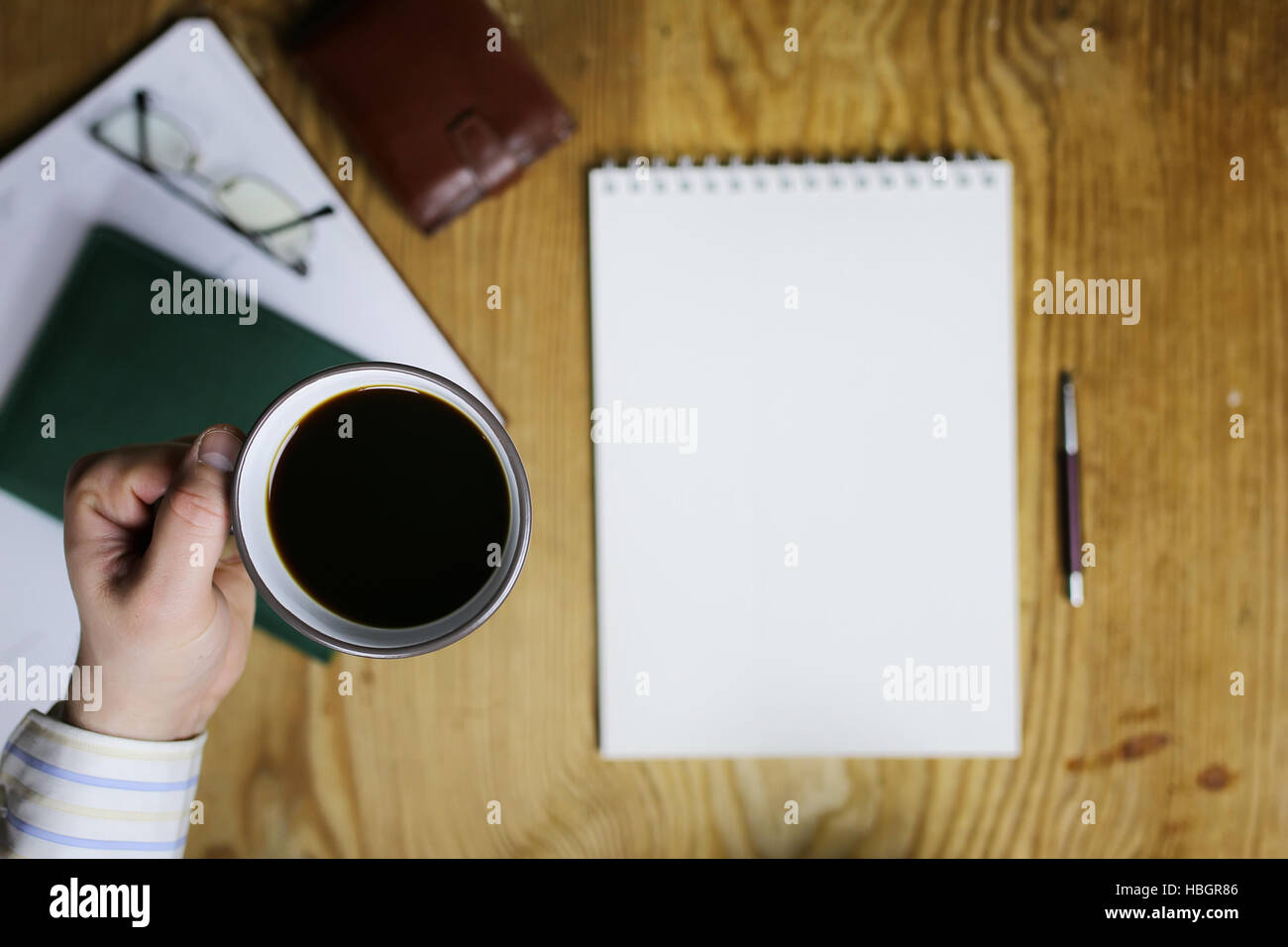 table write hand office view Stock Photo - Alamy