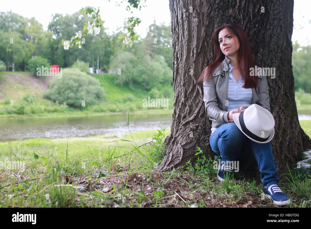 woman in tree park outdoor Stock Photo - Alamy