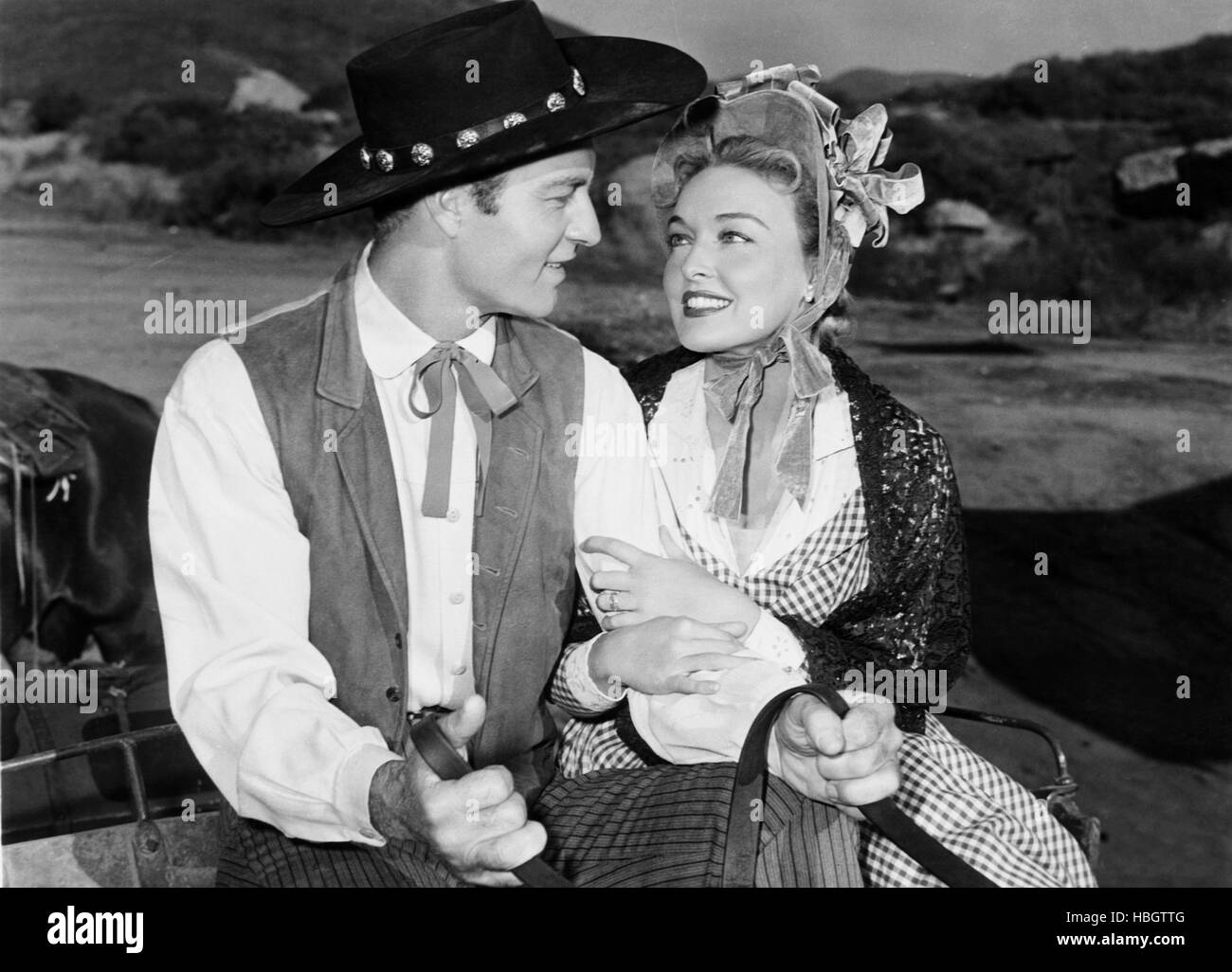 BADMAN'S COUNTRY, from left, George Montgomery, Karin Booth, 1958 Stock ...