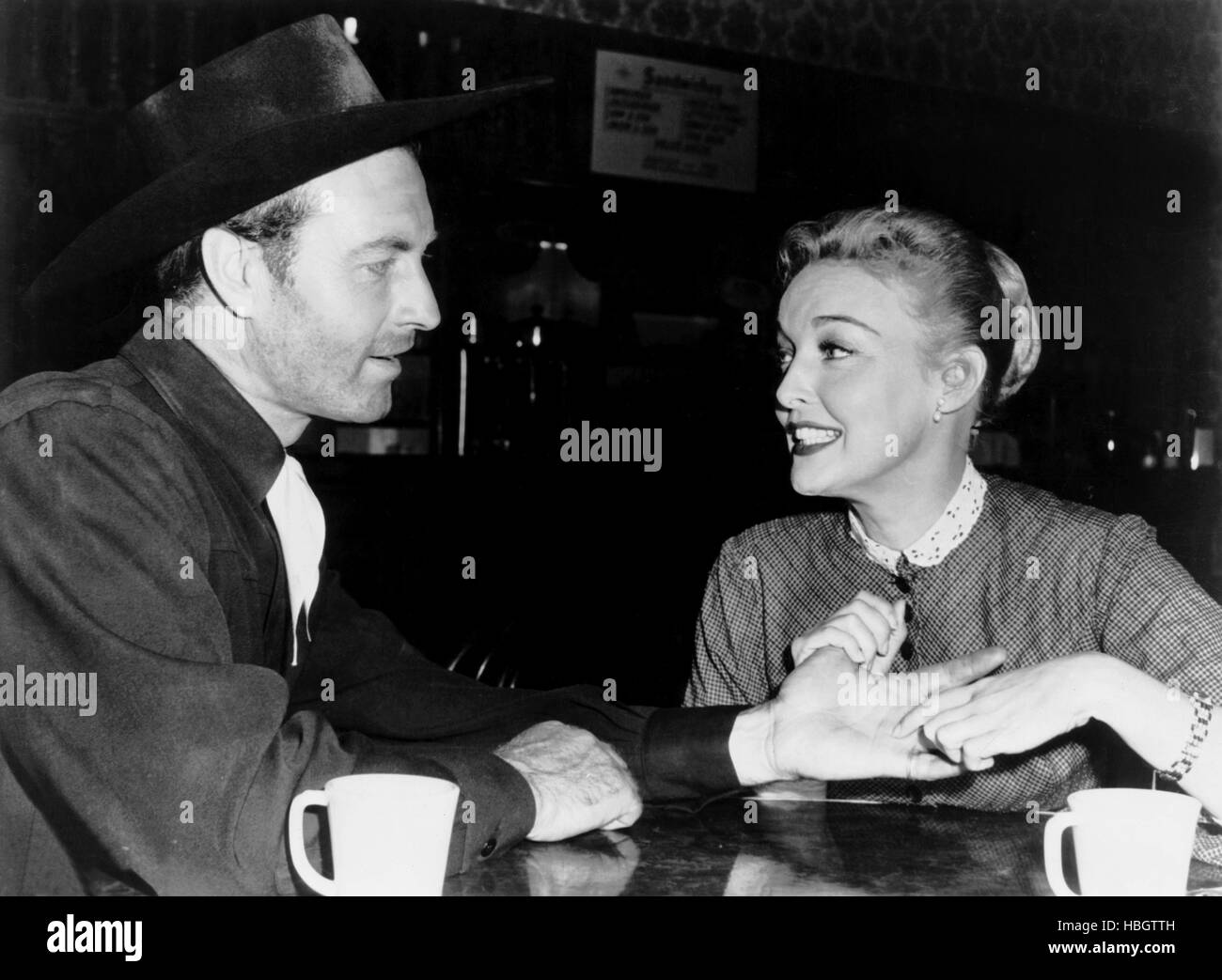 BADMAN'S COUNTRY, from left, George Montgomery, Karin Booth, 1958 Stock ...