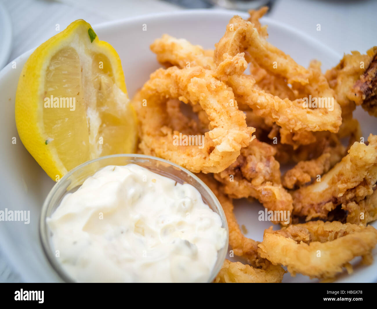 Deep fried calamari Stock Photo - Alamy