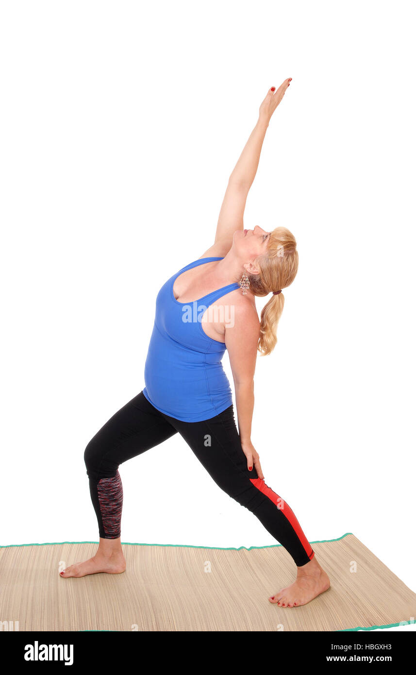 Yoga trainer showing poses Stock Photo - Alamy