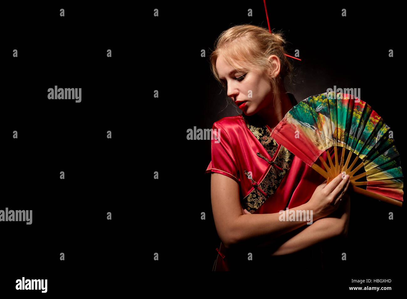 girl with fan Stock Photo - Alamy