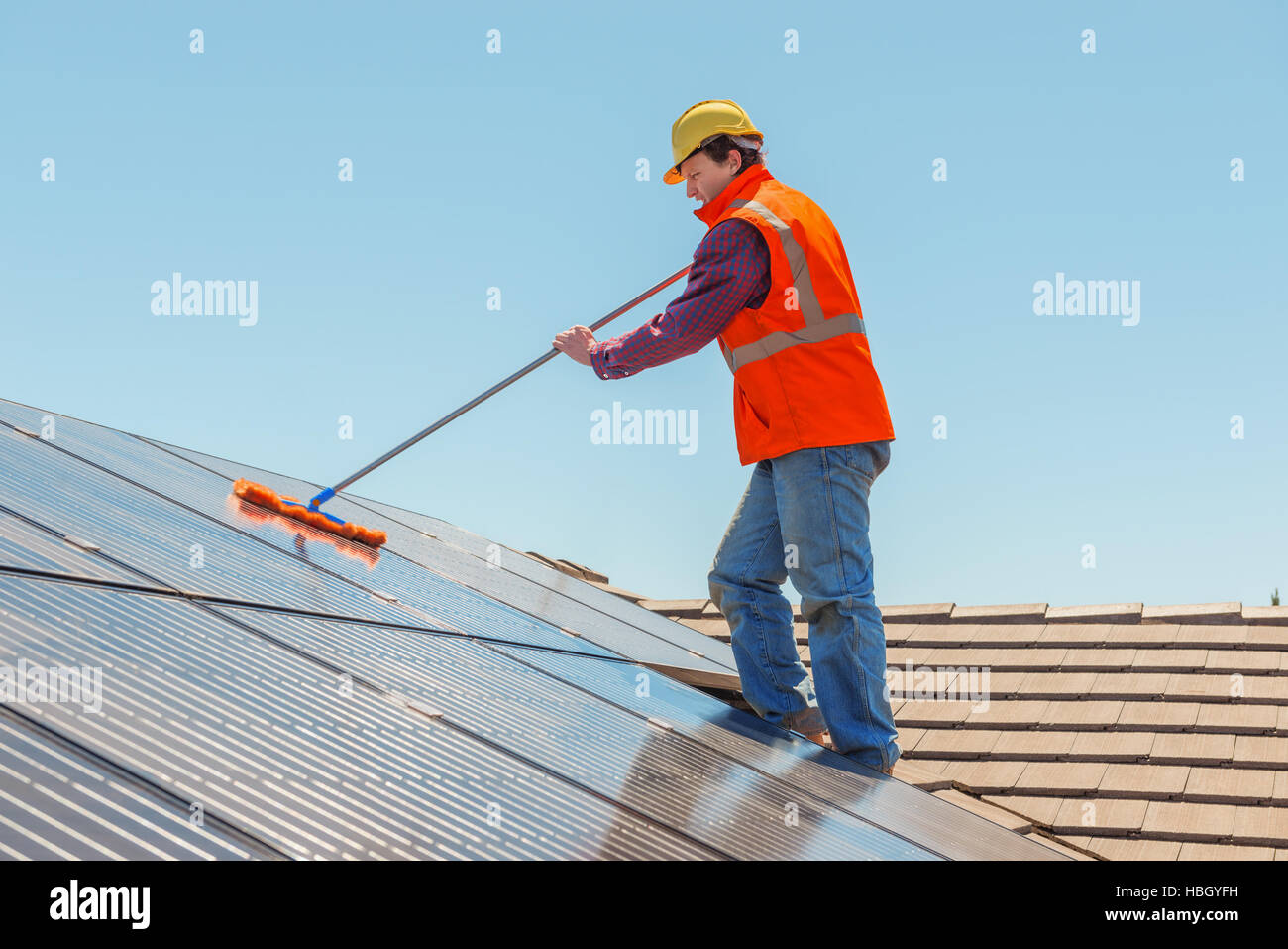 worker and solar panels Stock Photo - Alamy