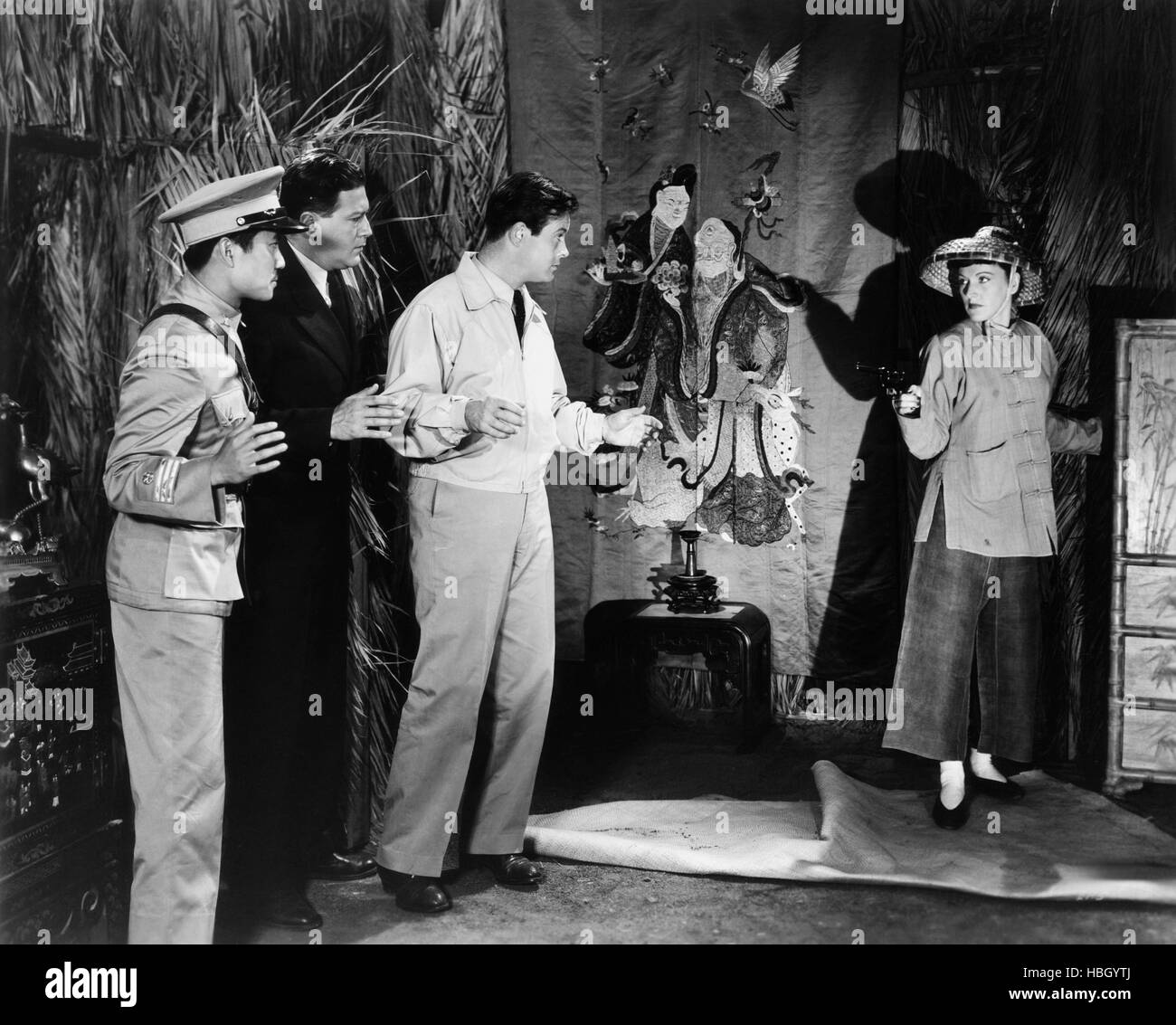 THE ADVENTURES OF SMILIN' JACK, from left, Keye Luke, Edgar Barrier ...