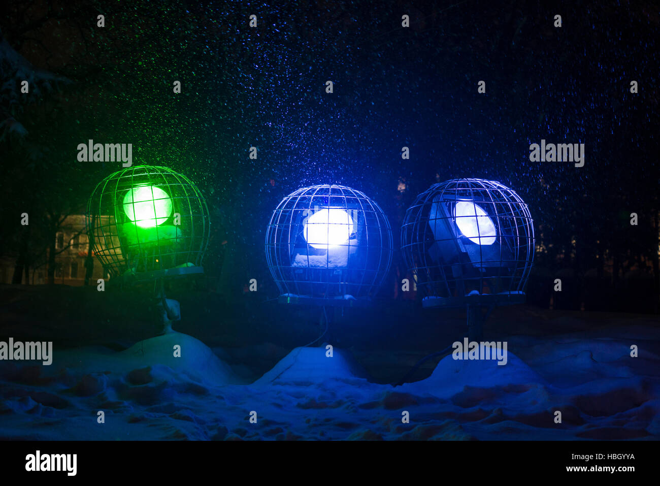 spotlights shining on the falling snow Stock Photo - Alamy