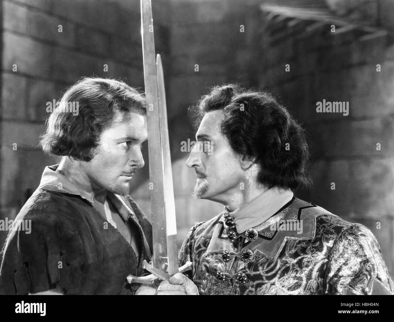 THE ADVENTURES OF ROBIN HOOD, from left: Errol Flynn, Basil Rathbone ...