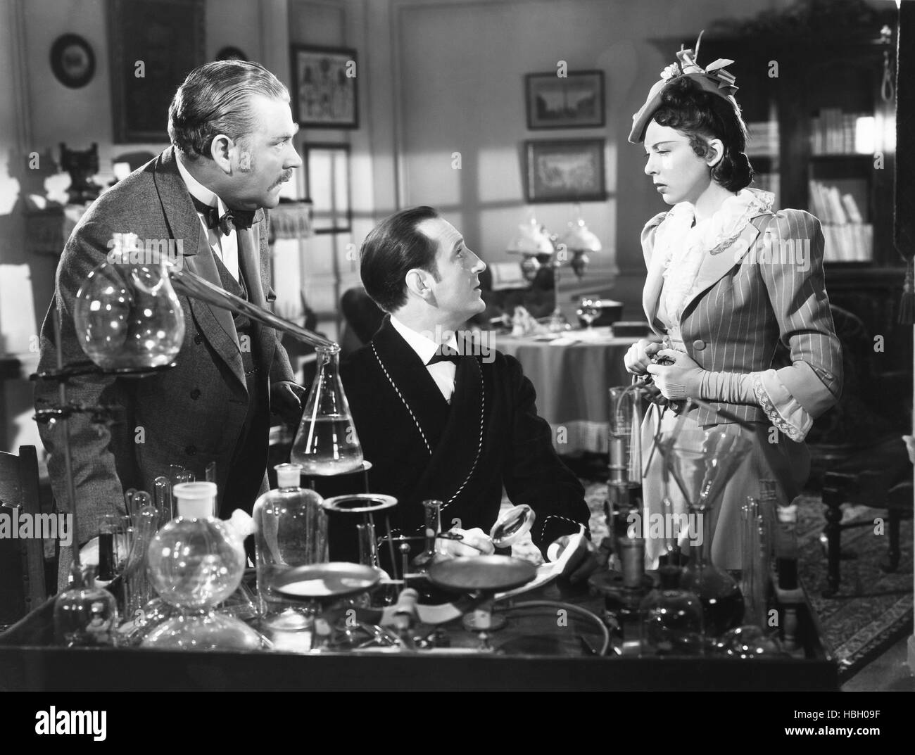 THE ADVENTURES OF SHERLOCK HOLMES, from left: Nigel Bruce as Dr. Watson ...