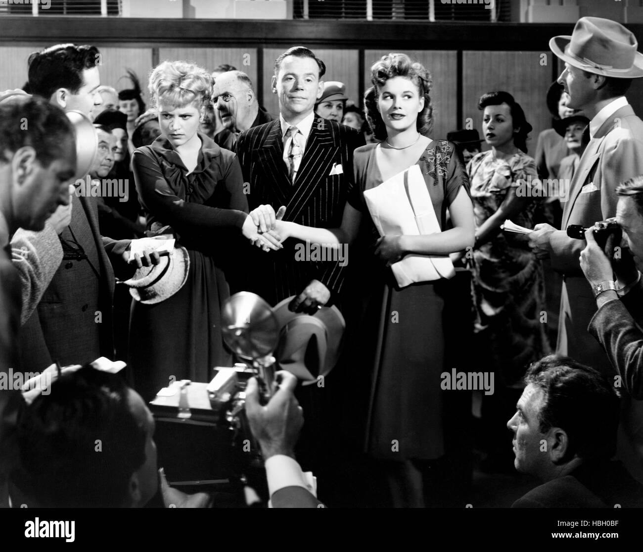 ADAM'S RIB, facing front from left: Judy Holliday, Tom Ewell, Jean ...