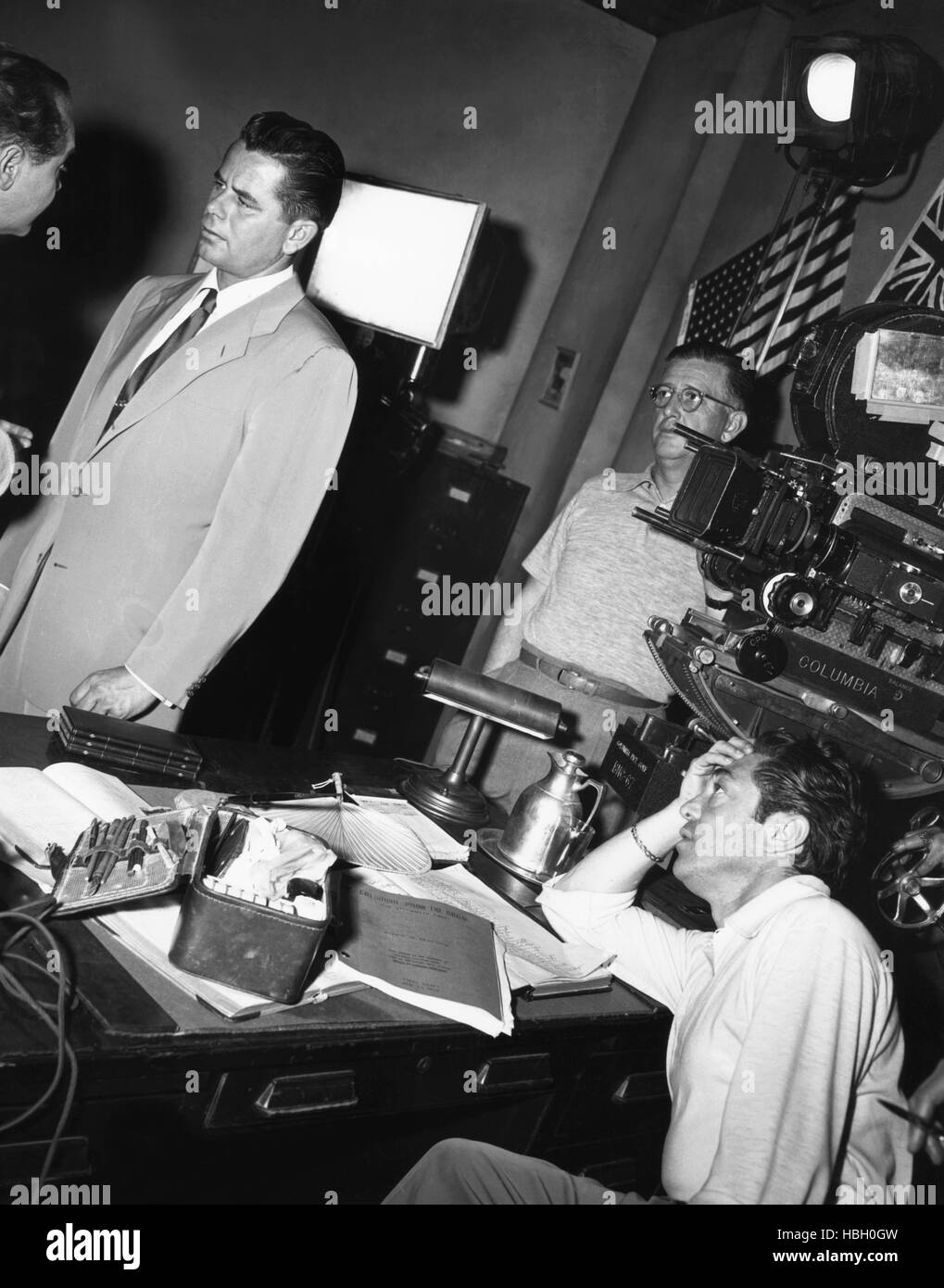 AFFAIR IN TRINIDAD, standing from left: Steven Geray, Glenn Ford ...