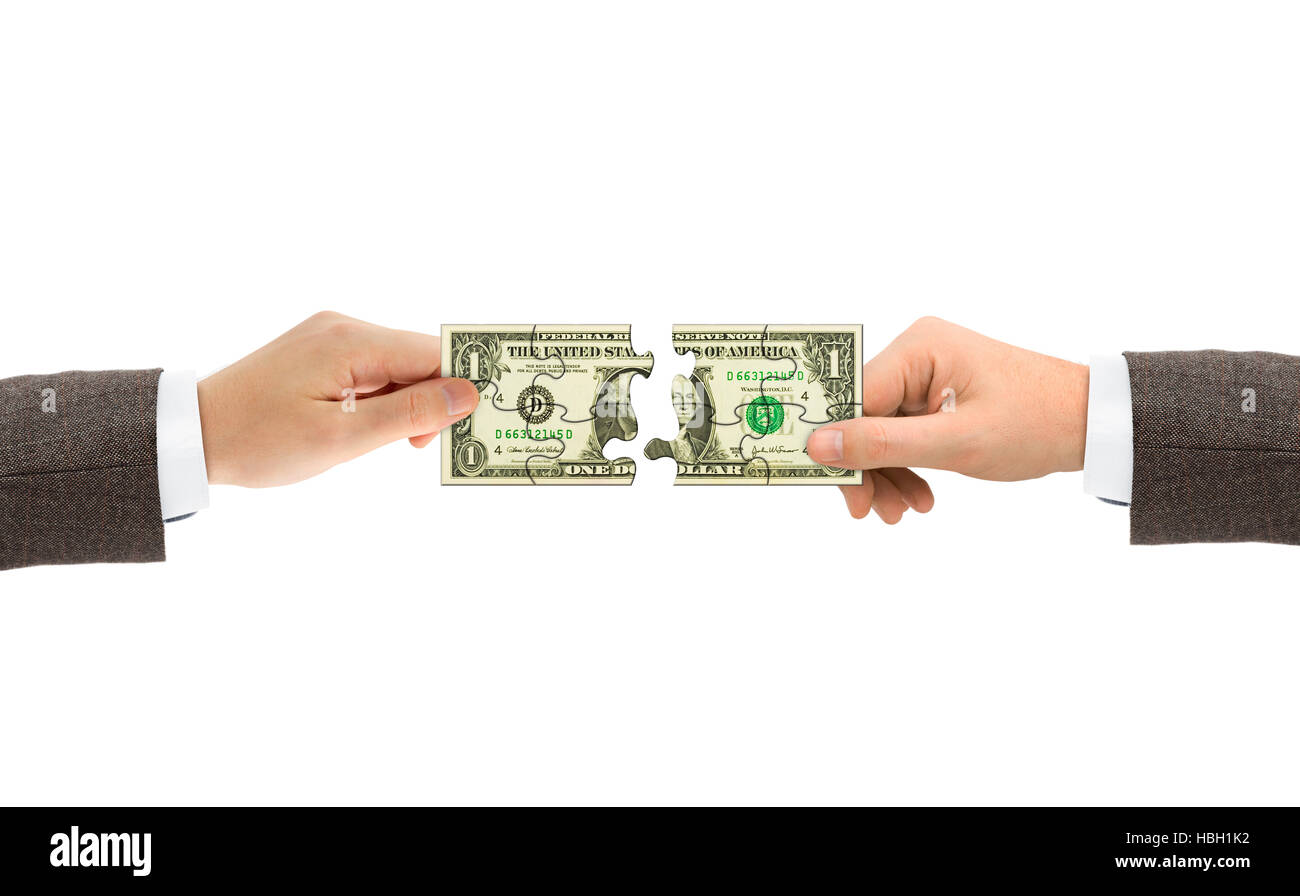Hands and money puzzle Stock Photo - Alamy