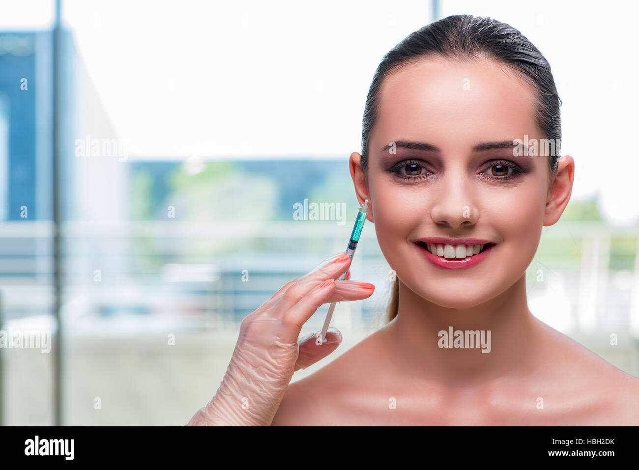 Beautiful woman preparing for botox injection Stock Photo - Alamy