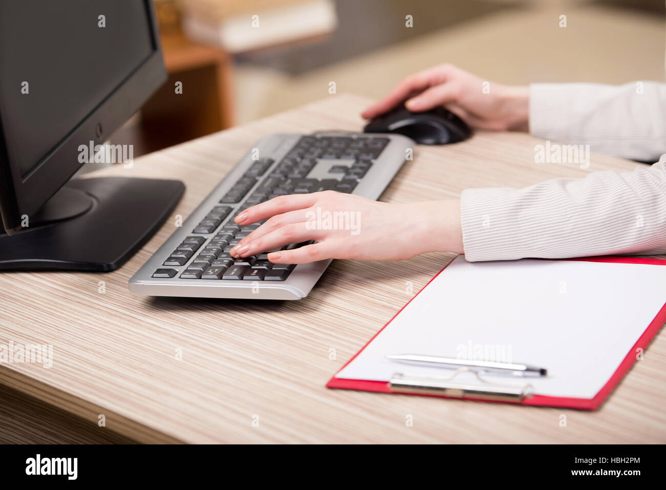 Hands working on the keyboard in the office Stock Photo - Alamy
