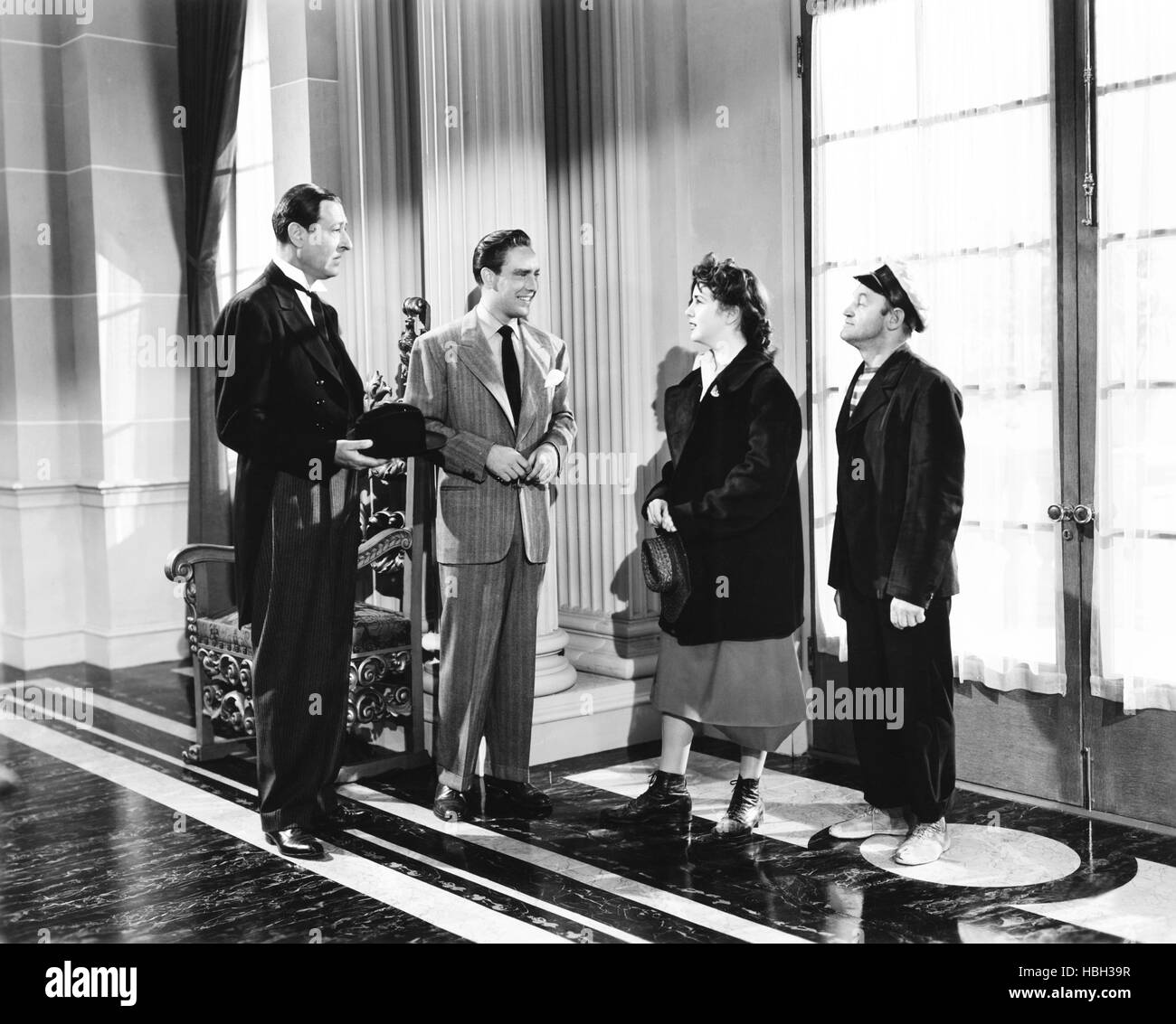 THE AMAZING MRS. HALLIDAY, from left: Arthur Treacher, Edmond O'Brien ...