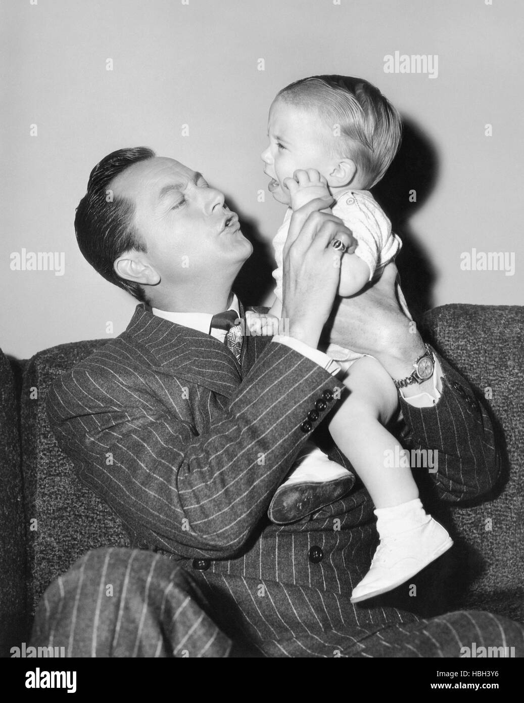 AND BABY MAKES THREE, Robert Young, 1949 Stock Photo - Alamy