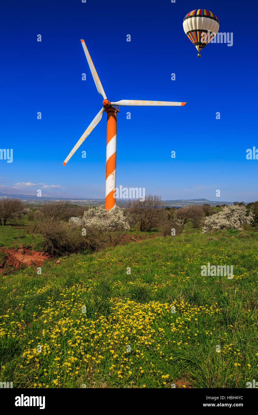 Over a huge windmill flying balloon Stock Photo - Alamy