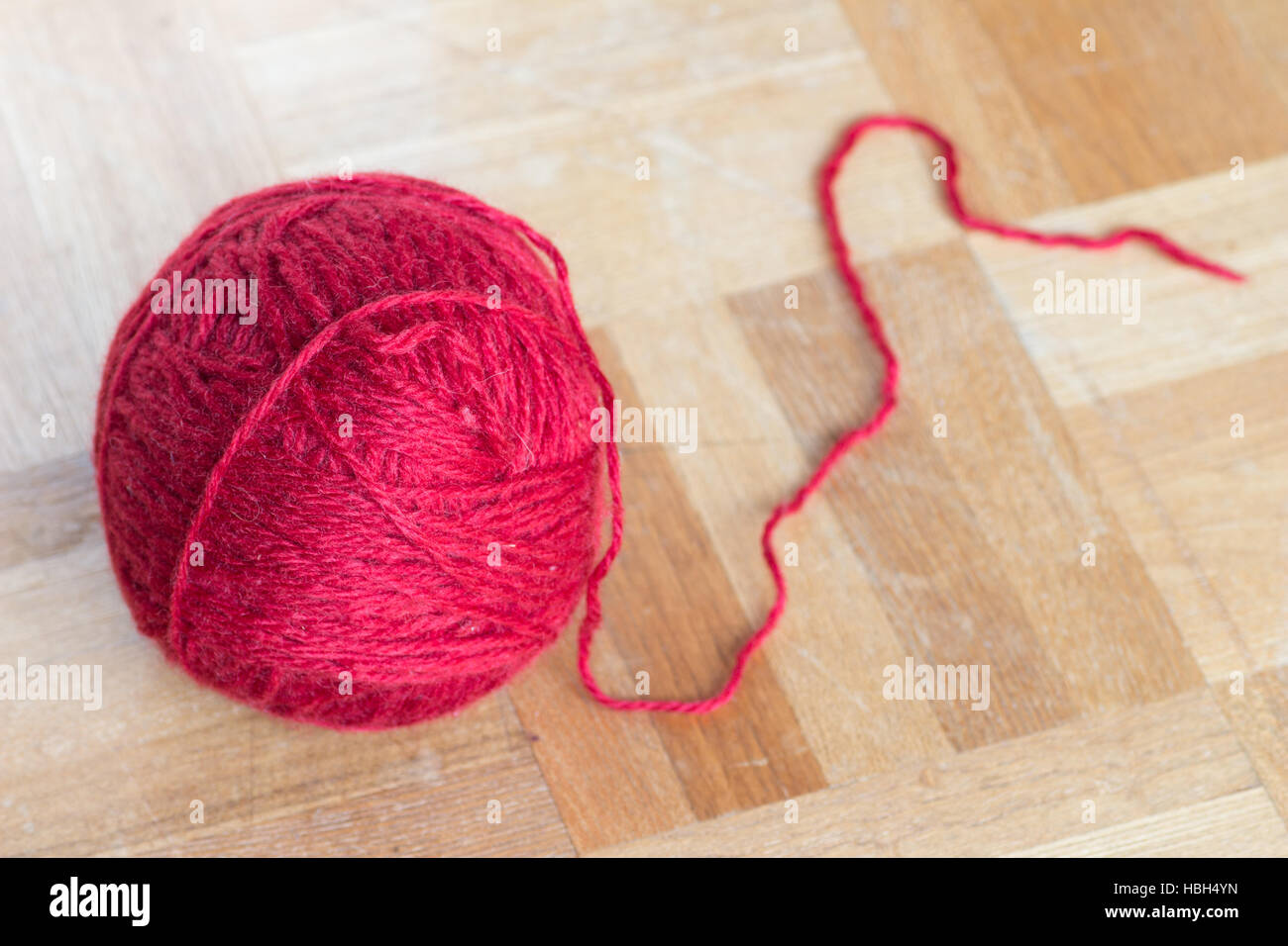 Red ball of string hi-res stock photography and images - Alamy