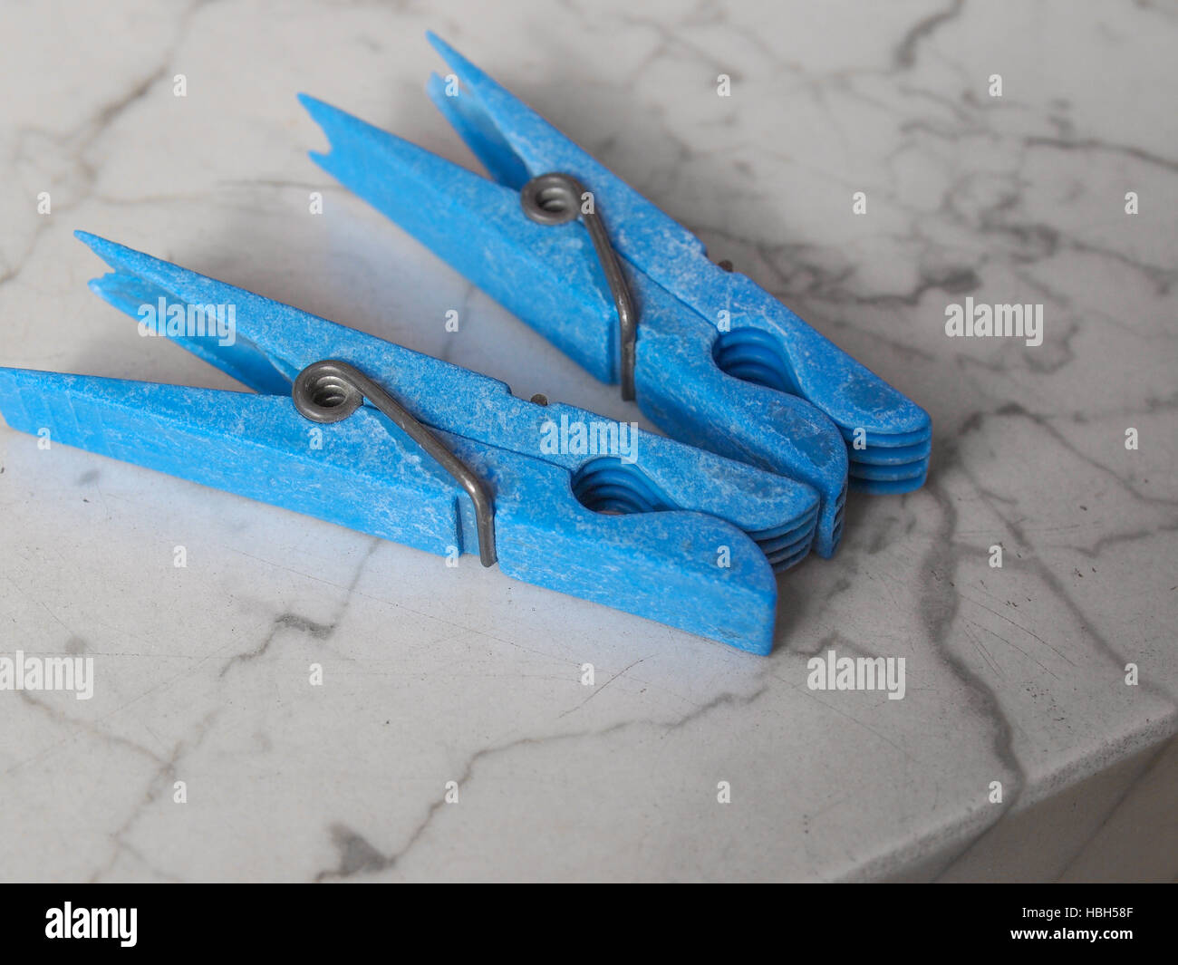 Blue Clothespin peg Stock Photo - Alamy