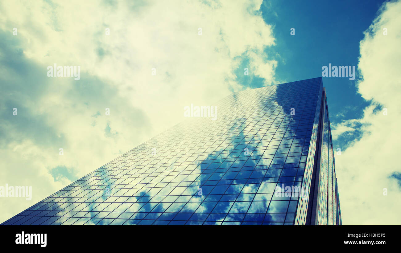 Skyscraper against blue sky Stock Photo - Alamy