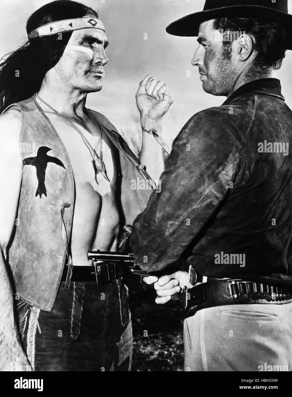 ARROWHEAD, from left: Jack Palance, Charlton Heston, 1953 Stock Photo ...
