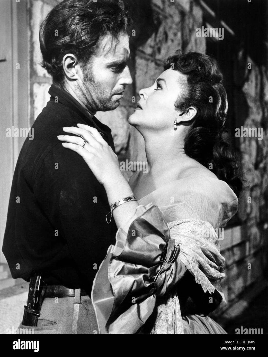 ARROWHEAD, from left, Charlton Heston, Mary Sinclair, 1953 Stock Photo ...