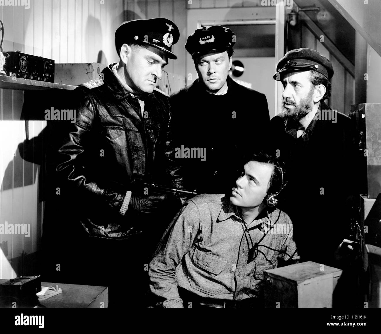 ATLANTIC CONVOY, from left, Hans Schumm, Erik Rolf, John Beal, (seated ...