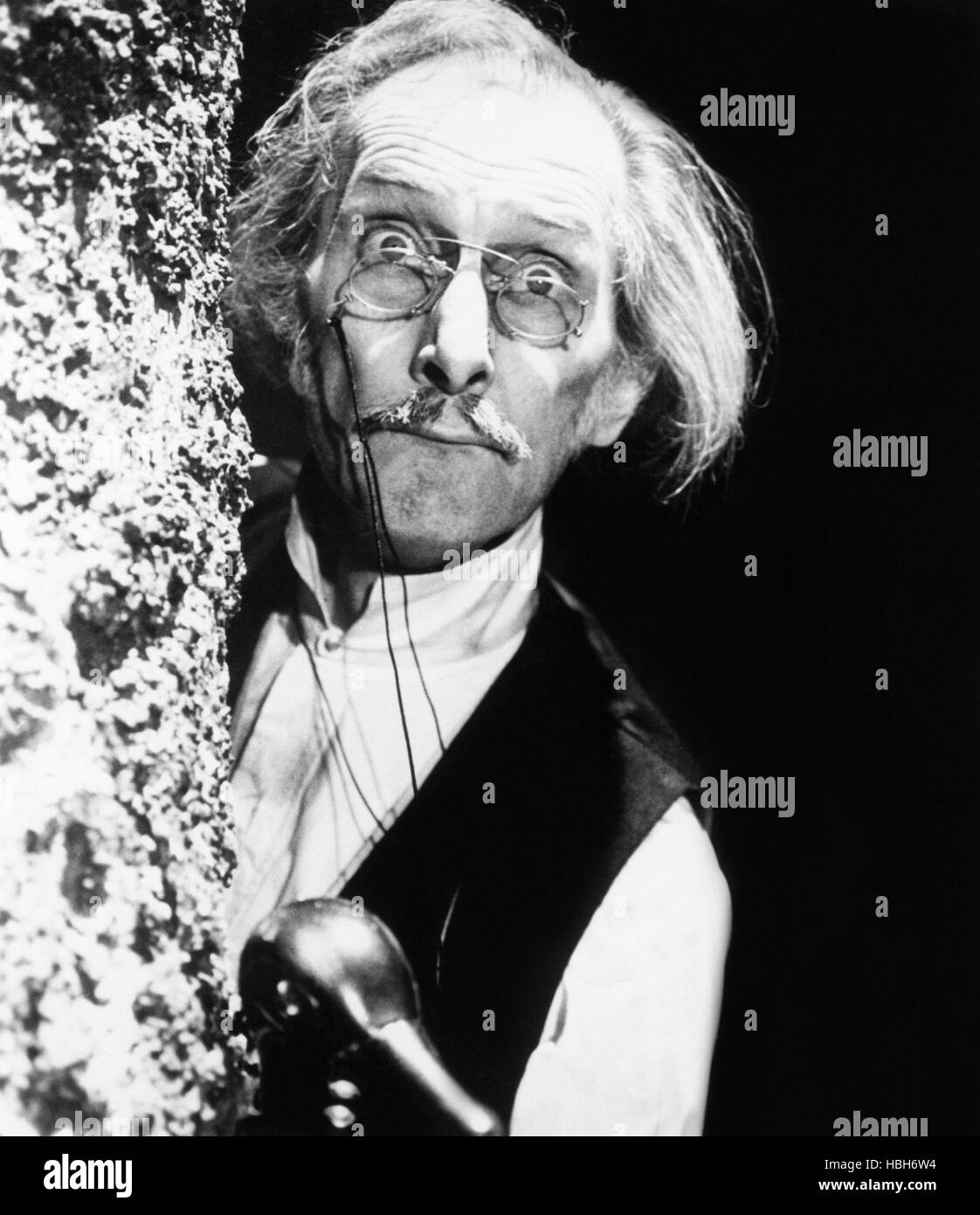 AT THE EARTH' CORE, Peter Cushing, 1976 Stock Photo - Alamy