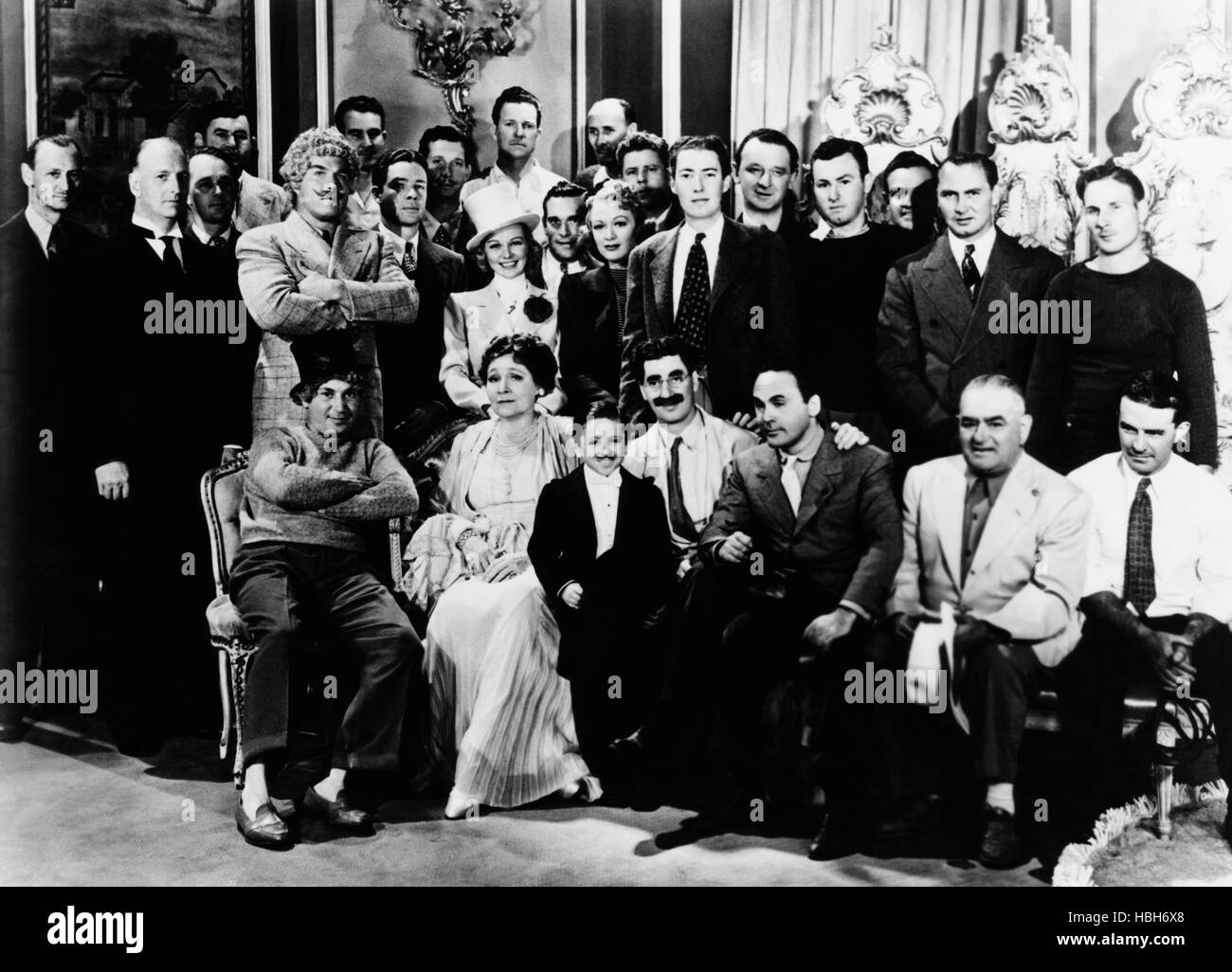 AT THE CIRCUS, cast and crew on set, seated from left: Harpo Marx ...
