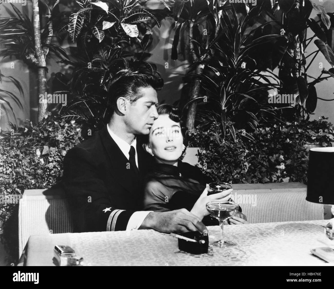 AWAY ALL BOATS, from left: George Nader, Julie Adams, 1956 Stock Photo ...