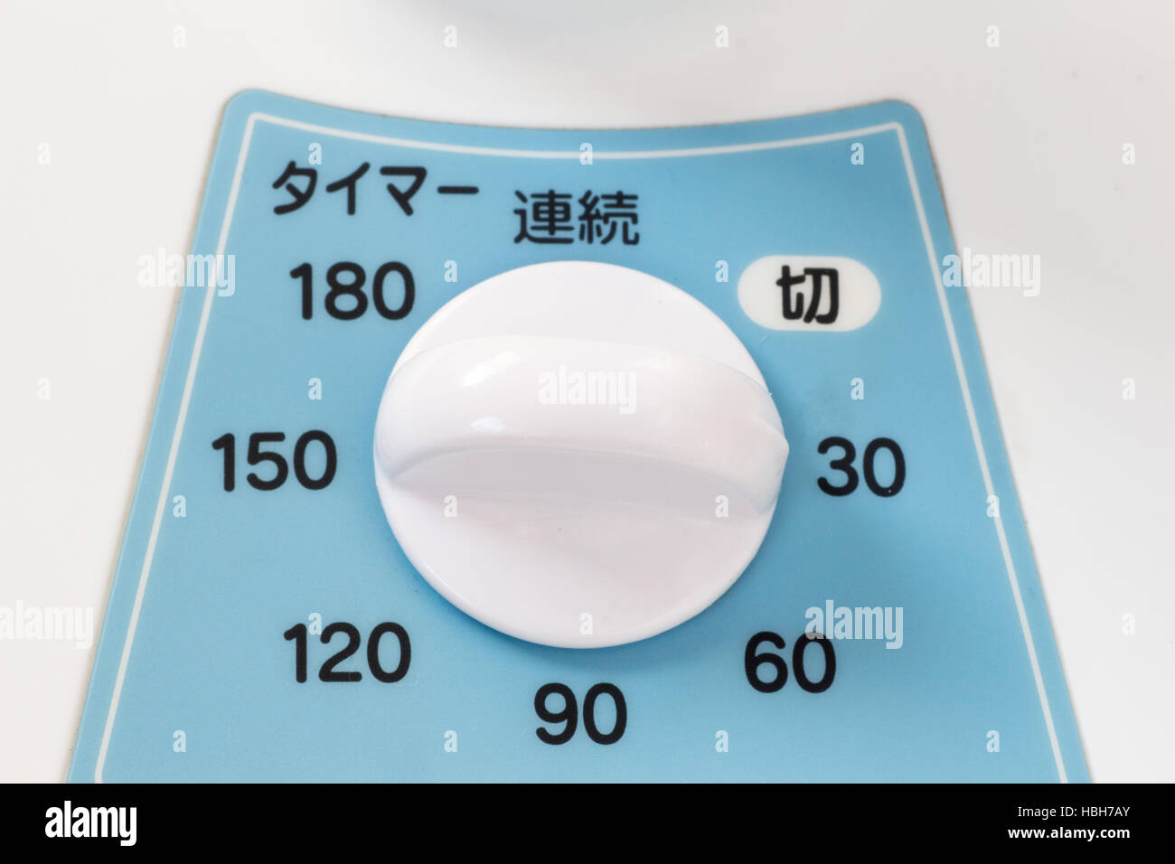 Analog timer device of a bule and white Japanese electric fan Stock ...