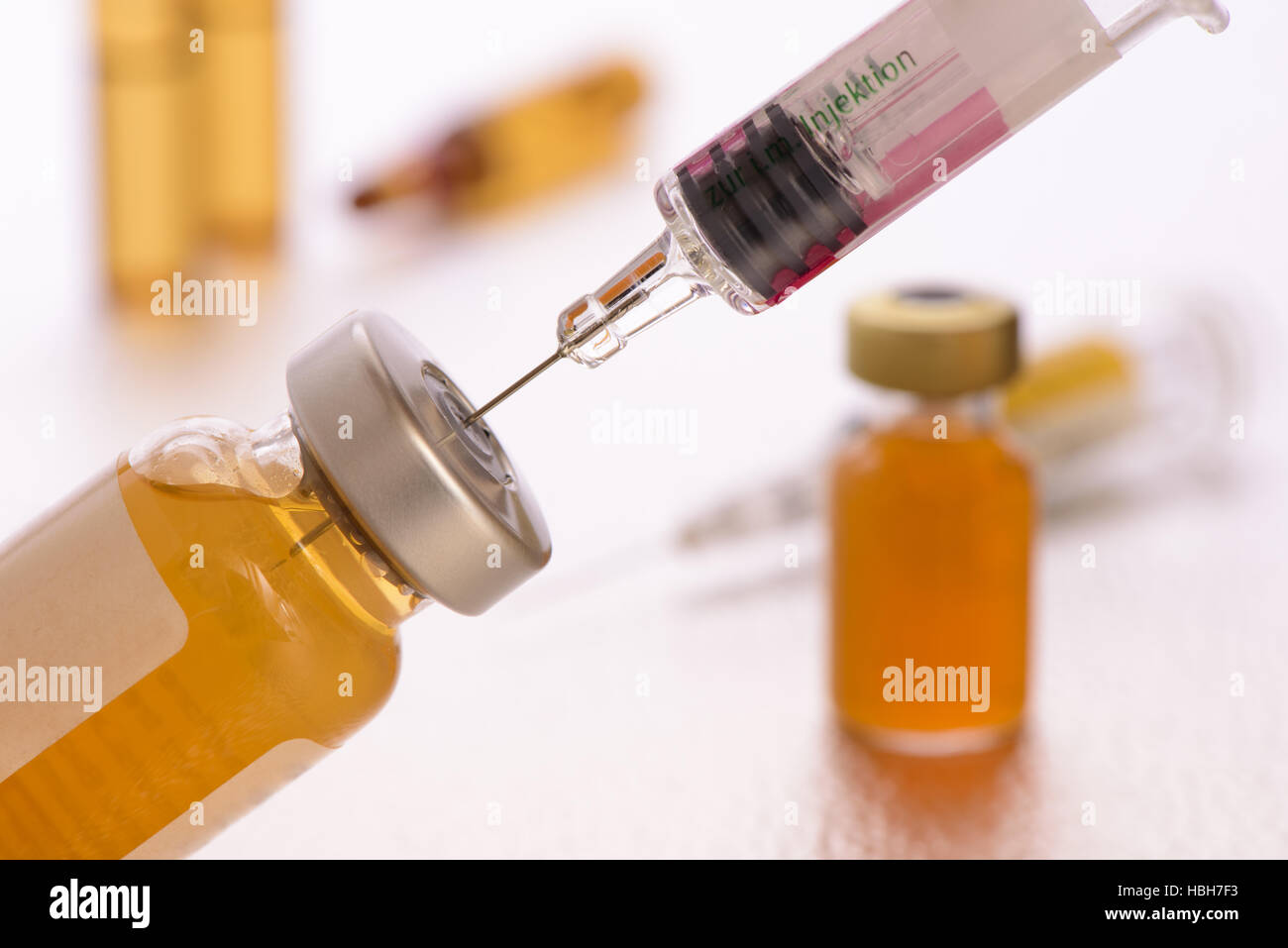 injection with syringe in medical laboratory Stock Photo - Alamy