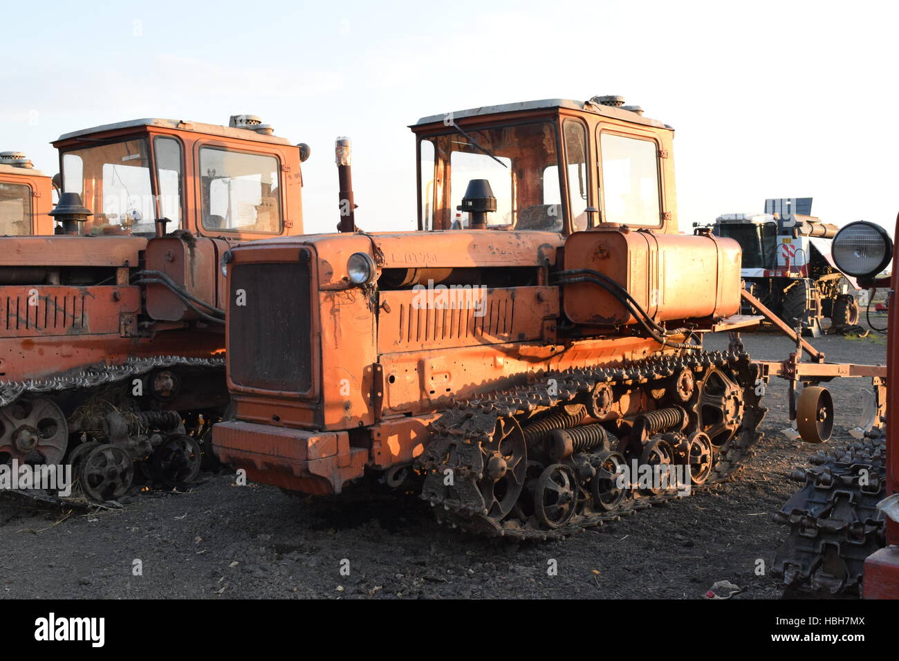 Tractor, standing in a row. Agricultural machinery Stock Photo - Alamy