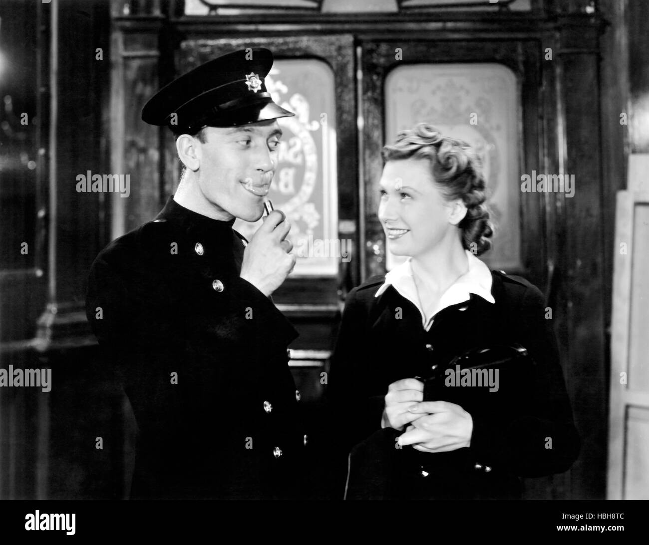 THE BELLS GO DOWN, from left, Tommy Trinder, Meriel Forbes, 1943 Stock ...