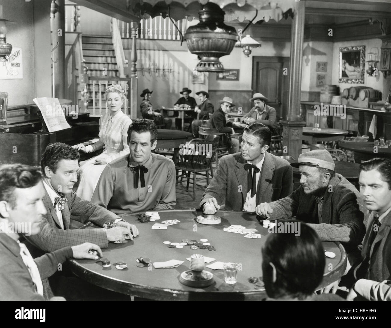 BEST OF THE BADMEN, at table clockwise from left: Lawrence Tierney ...