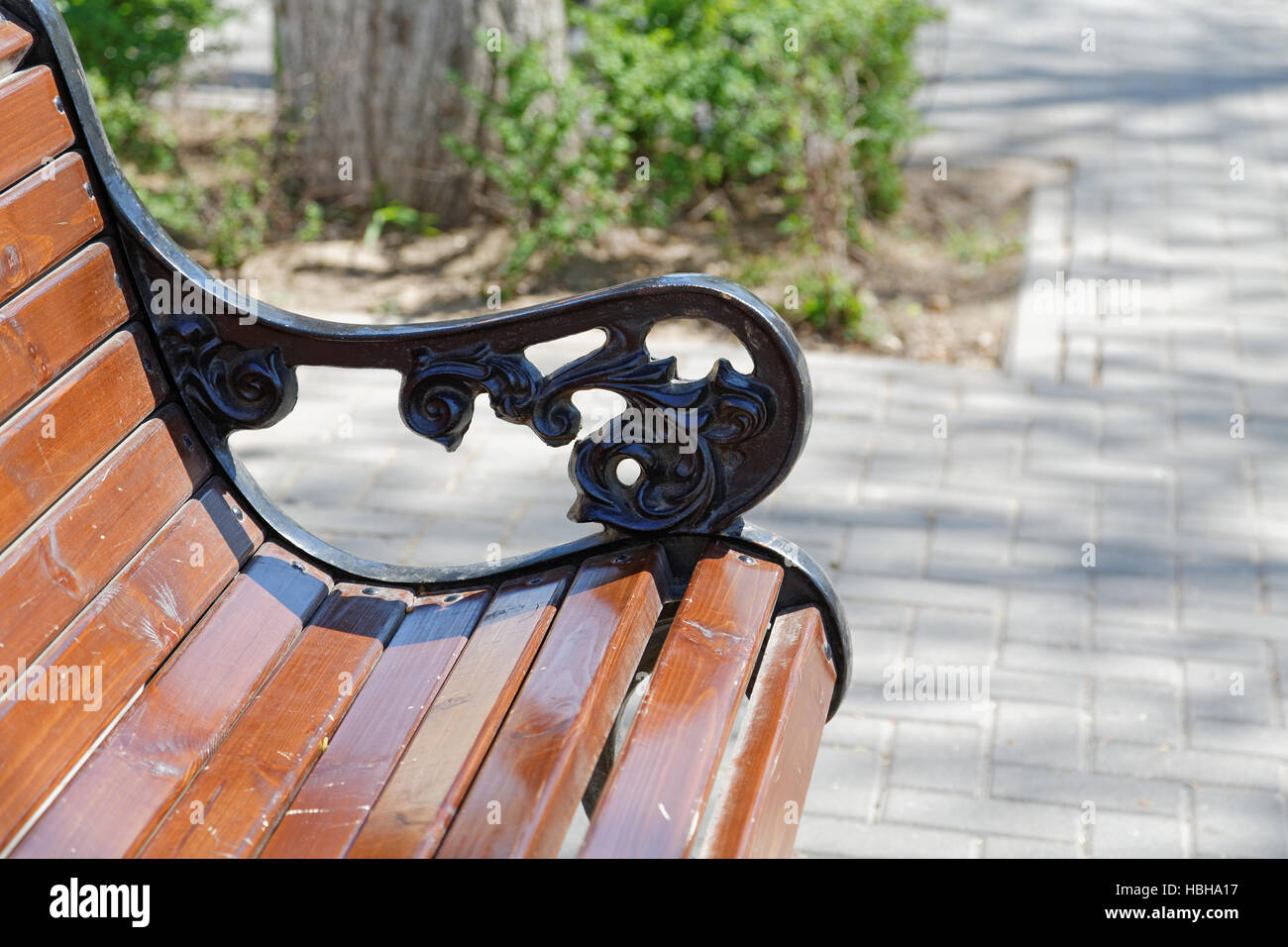 City bench closeup summer day Stock Photo - Alamy