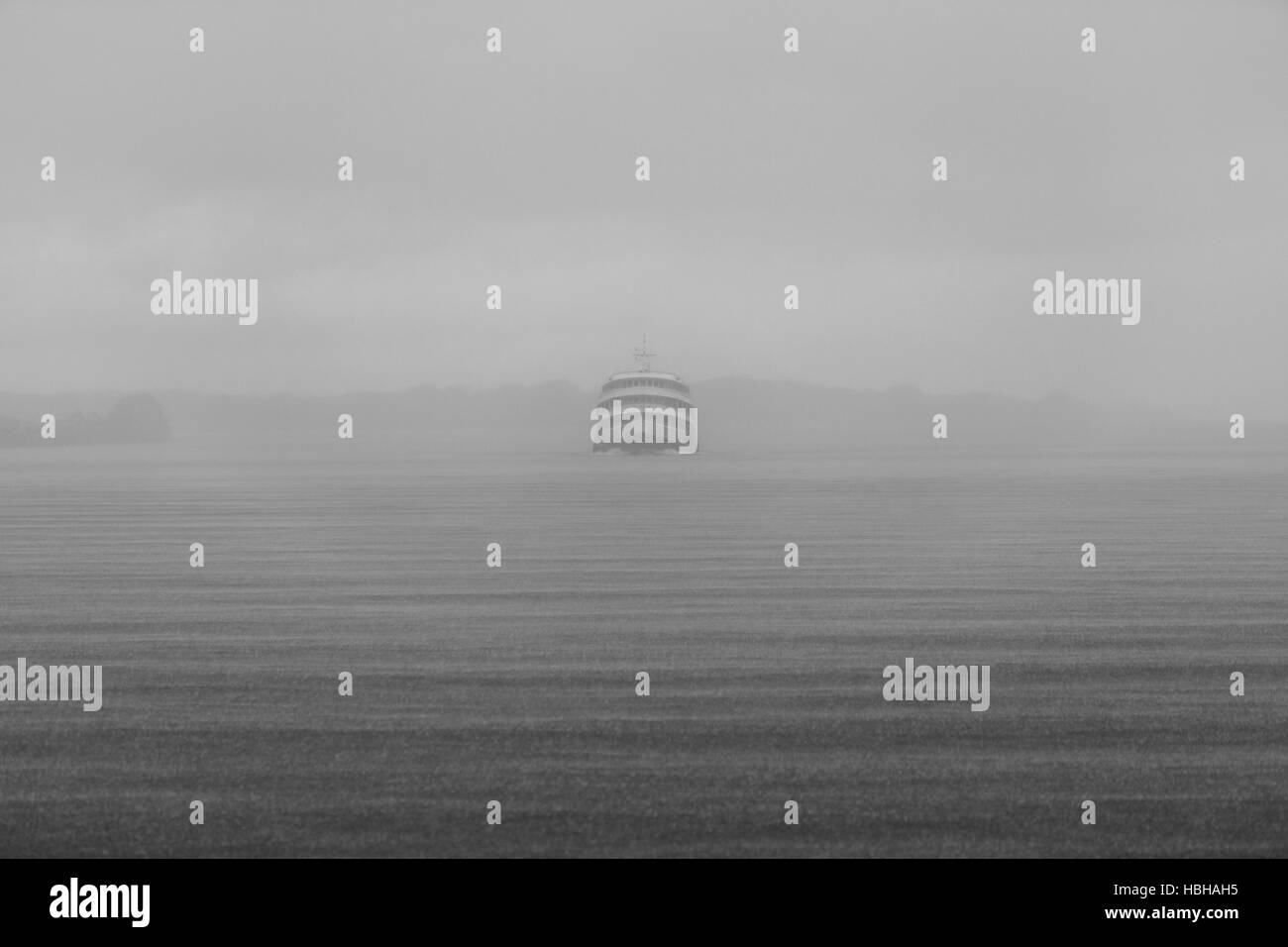 Boat on Amazon River with rain. Amazonas. Brazil Stock Photo - Alamy