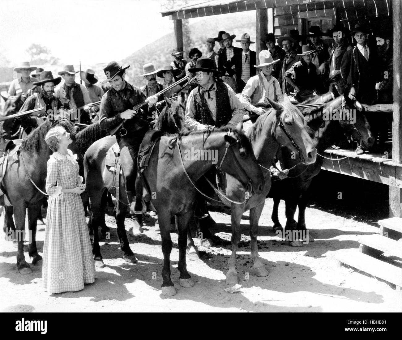 BILLY THE KID, Kay Johnson (standing front), Johnny Mack Brown, Wallace ...