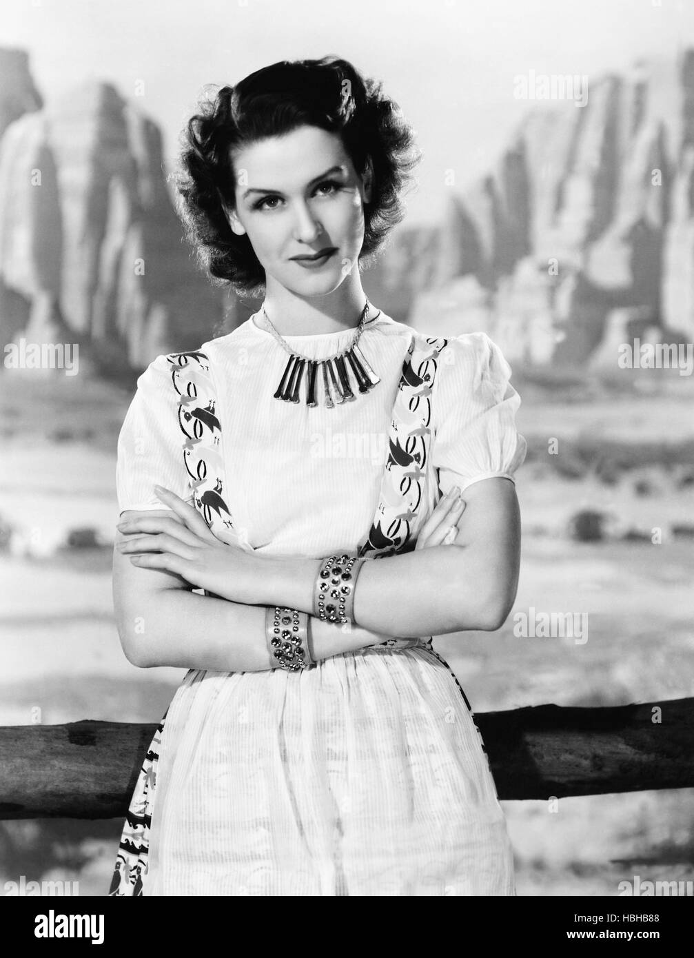 BILLY THE KID, Mary Howard, modeling Western-themed jewelry, 1941 Stock ...