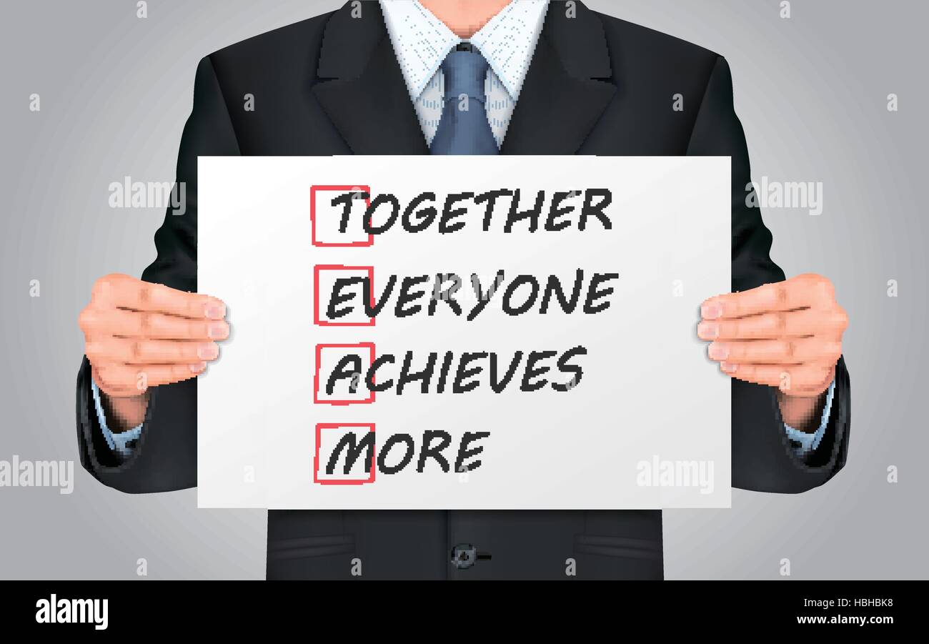 close-up look at businessman holding Together Everyone Achieves More ... close-up look at businessman holding Together Everyone Achieves More ...