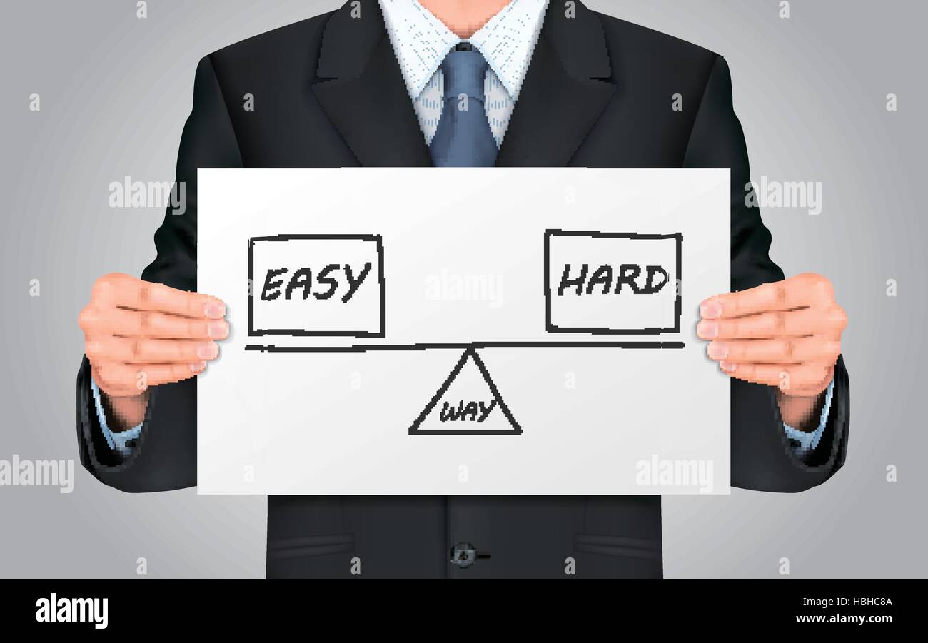 close-up look at businessman holding balance between ways of reaching a ...